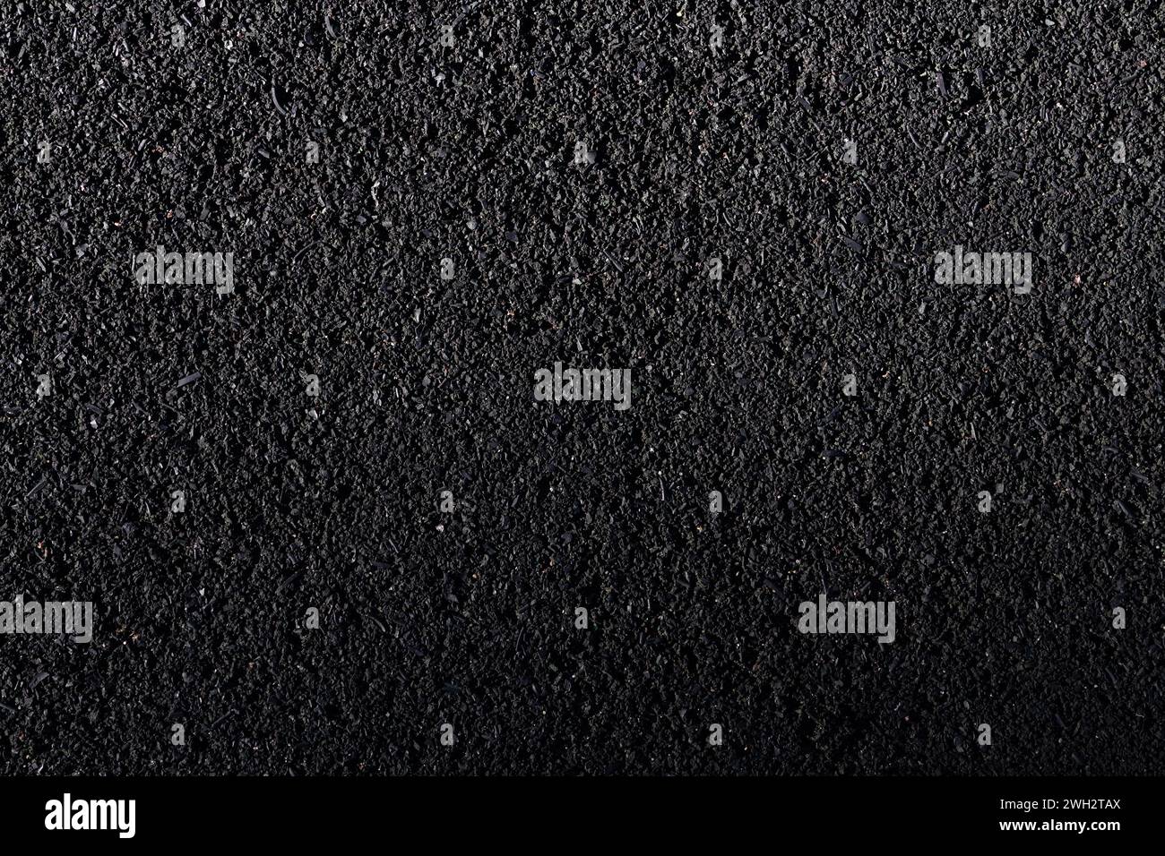 The texture of black rubberized asphalt. Rubber cover structure for ...