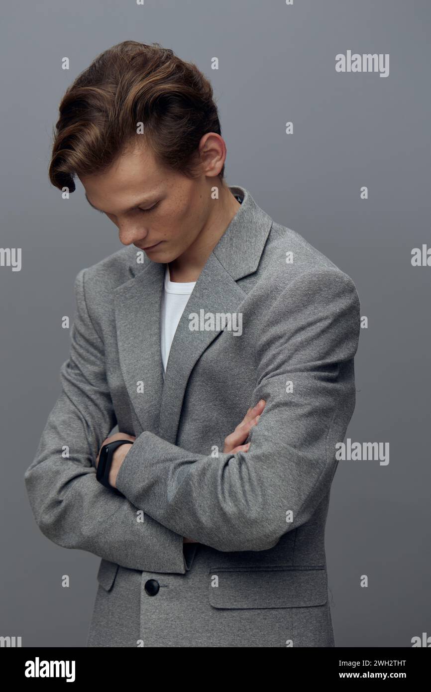 Modern Man: A Stylish and Confident Caucasian Model Poses in ...
