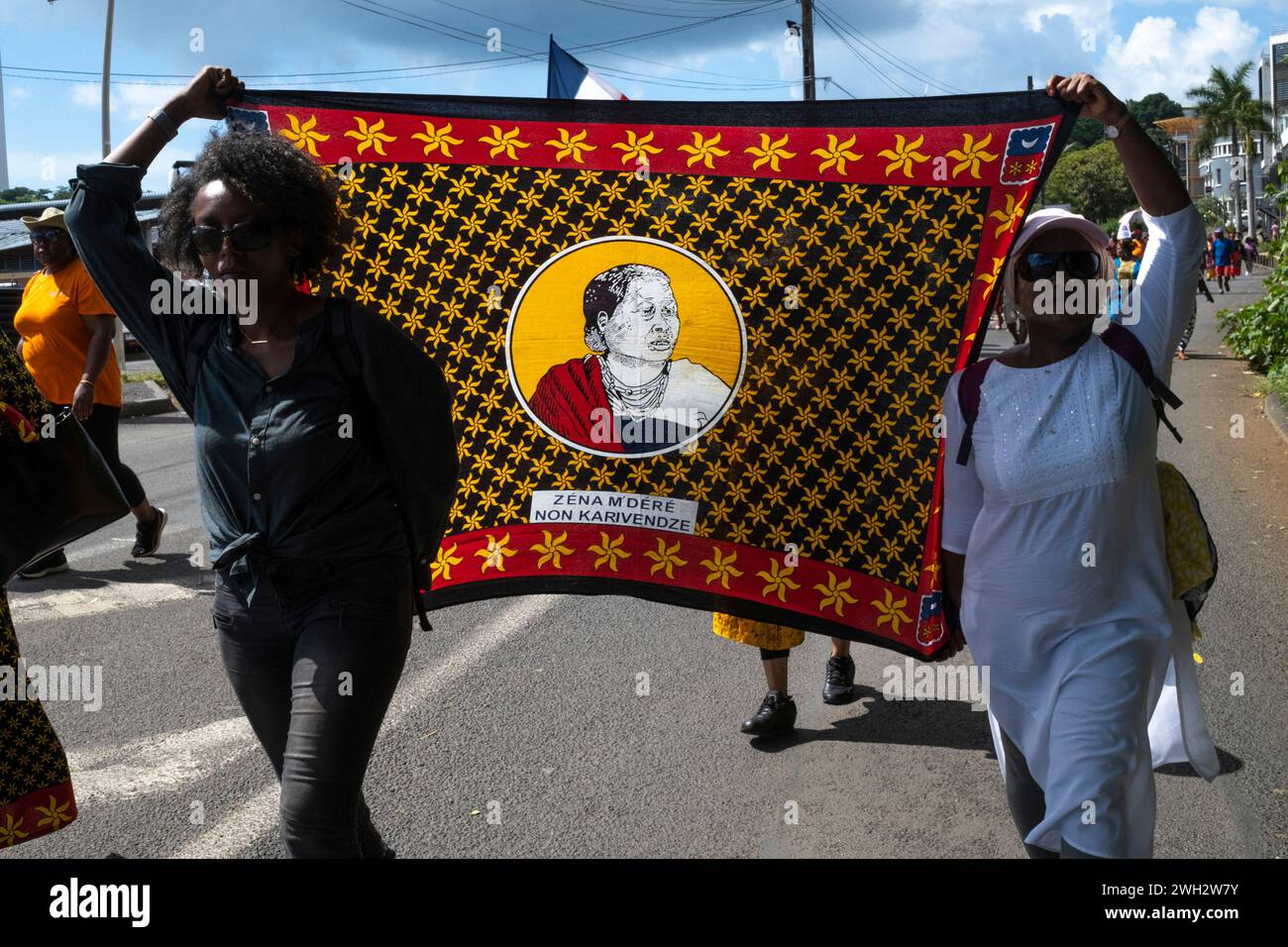 Mayotte. 06th Feb, 2024. Two demonstrators march in Mamoudzou with the ...