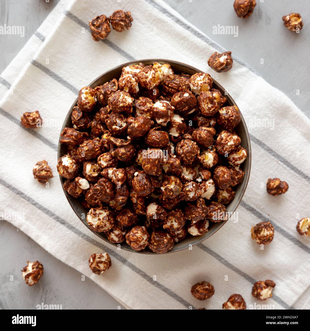 Homemade Chocolate Caramel Popcorn in a Bowl, top view. Flat lay ...