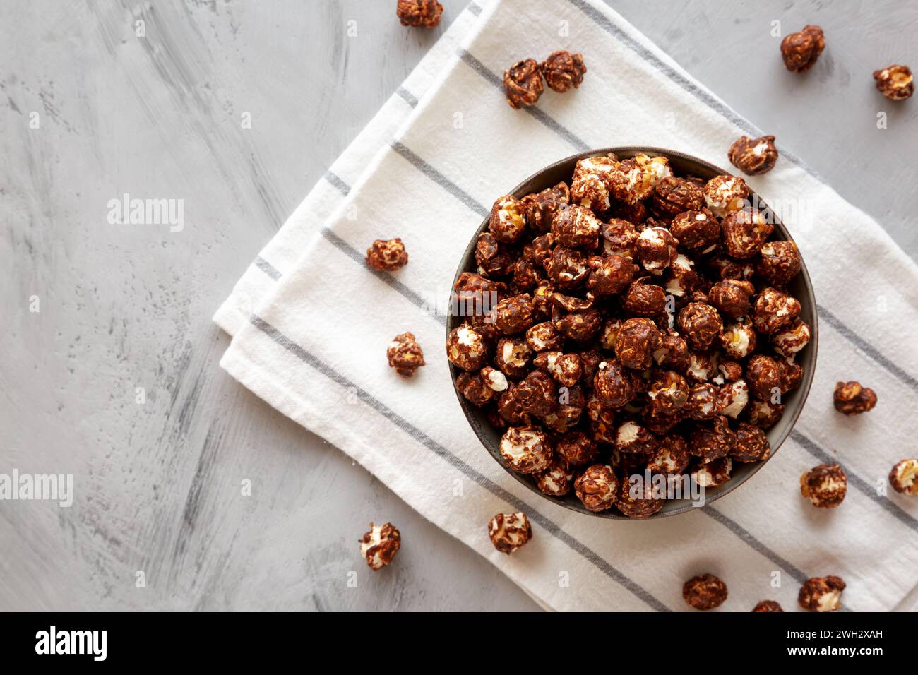 Homemade Chocolate Caramel Popcorn in a Bowl, top view. Flat lay ...