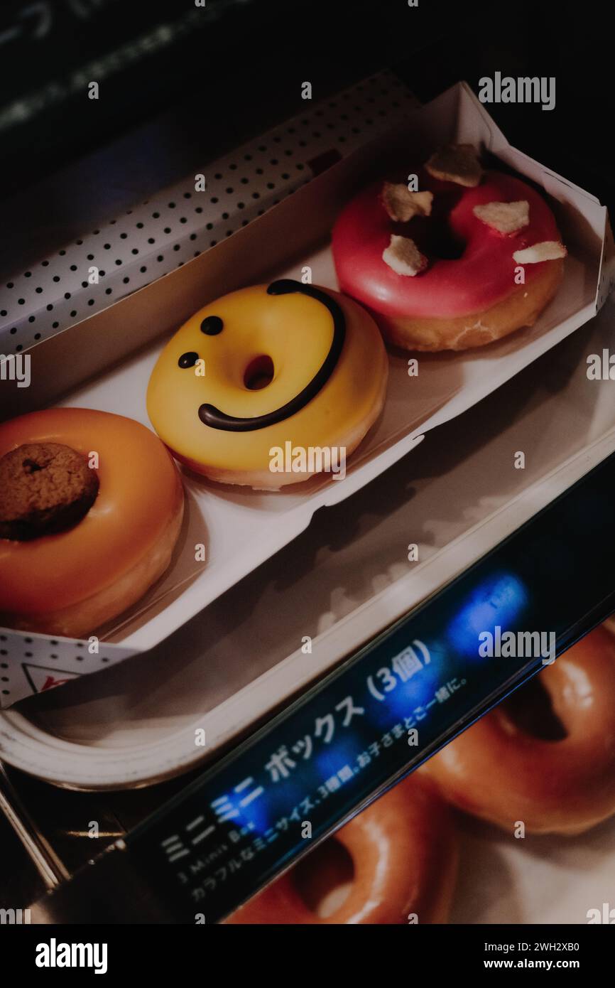 Tokyo, Japan, Krispy Kreme, smiley face doughnut Stock Photo - Alamy