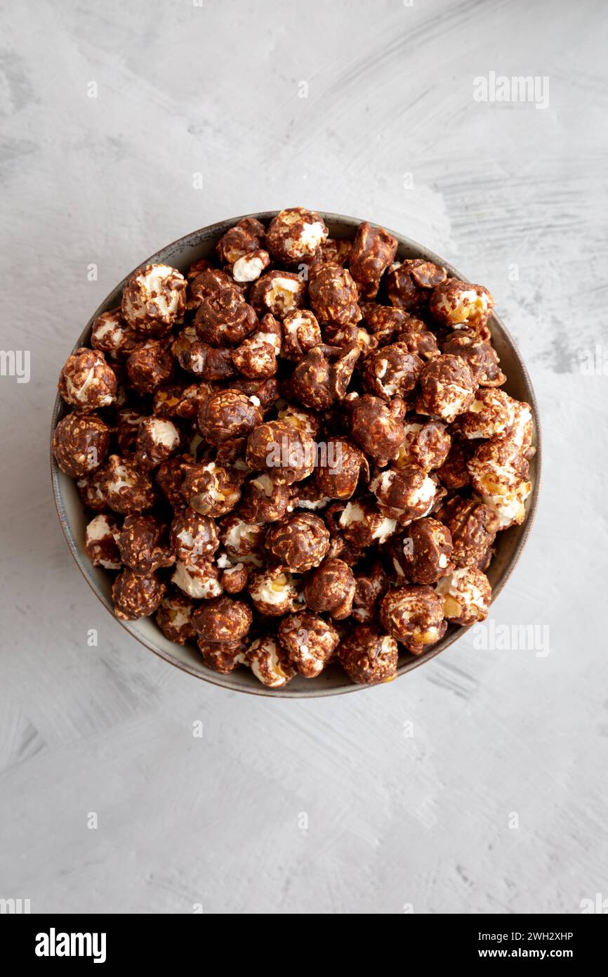 Homemade Chocolate Caramel Popcorn in a Bowl, top view. Flat lay ...