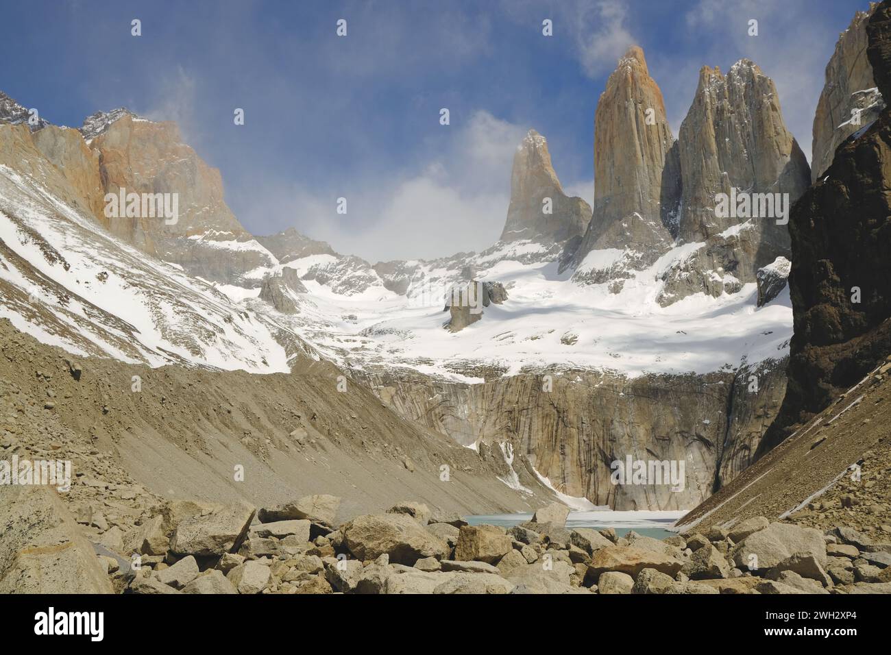 Torres del Paine, viewed from the lake at the foot of the peaks, known ...