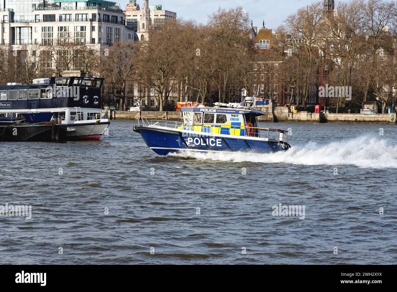 The Metropolitan Police launch, Nina Mackay lll, travelling at speed on ...