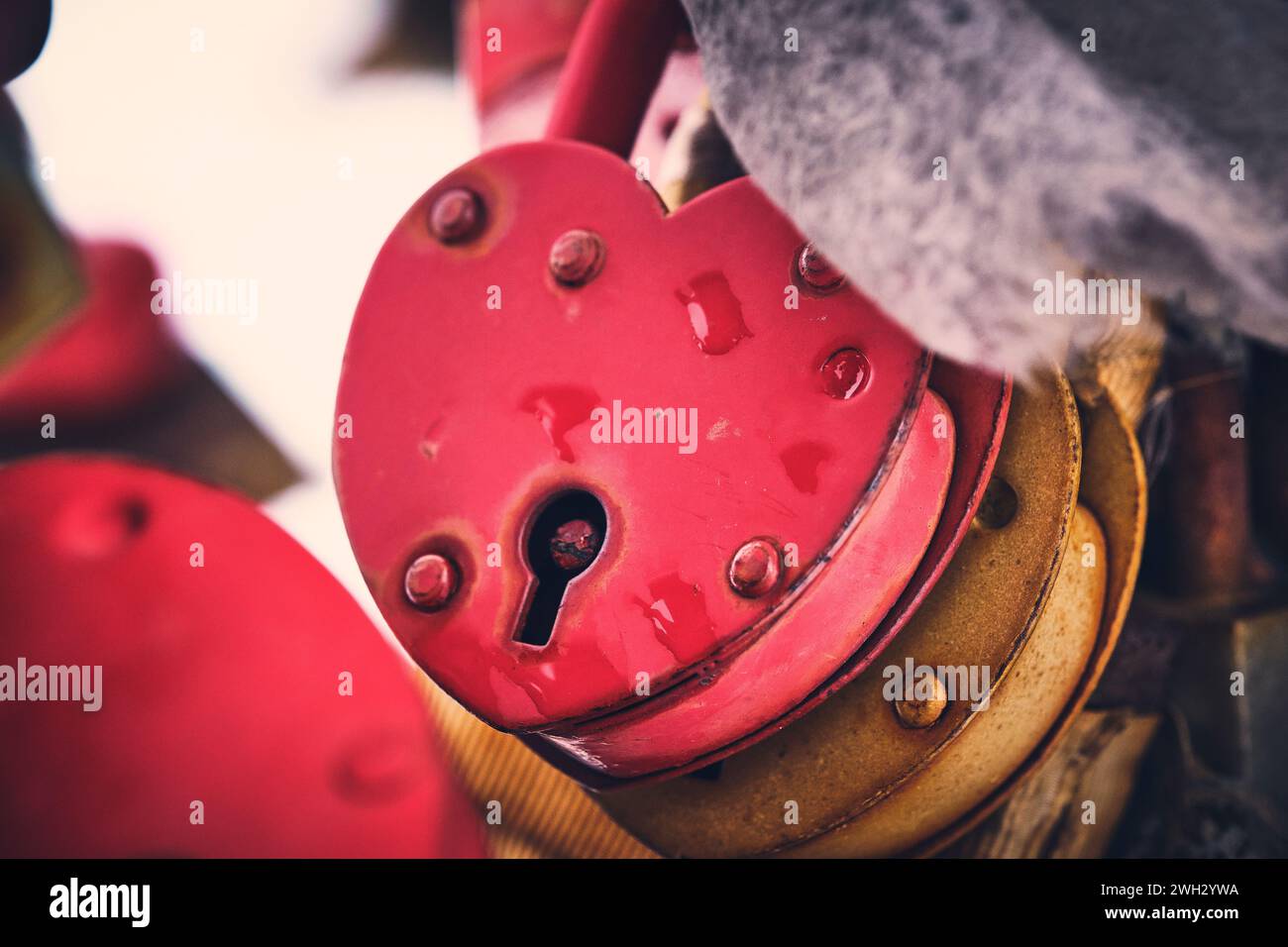 Heart shaped padlock among many old rusty locks Stock Photo - Alamy