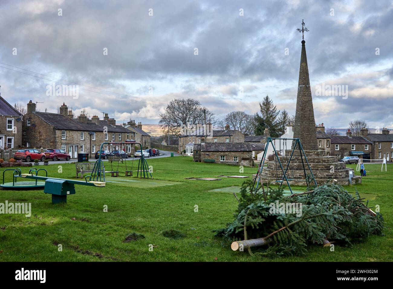 Centre of West Burton with domestic houses, playground, the octagonal ...