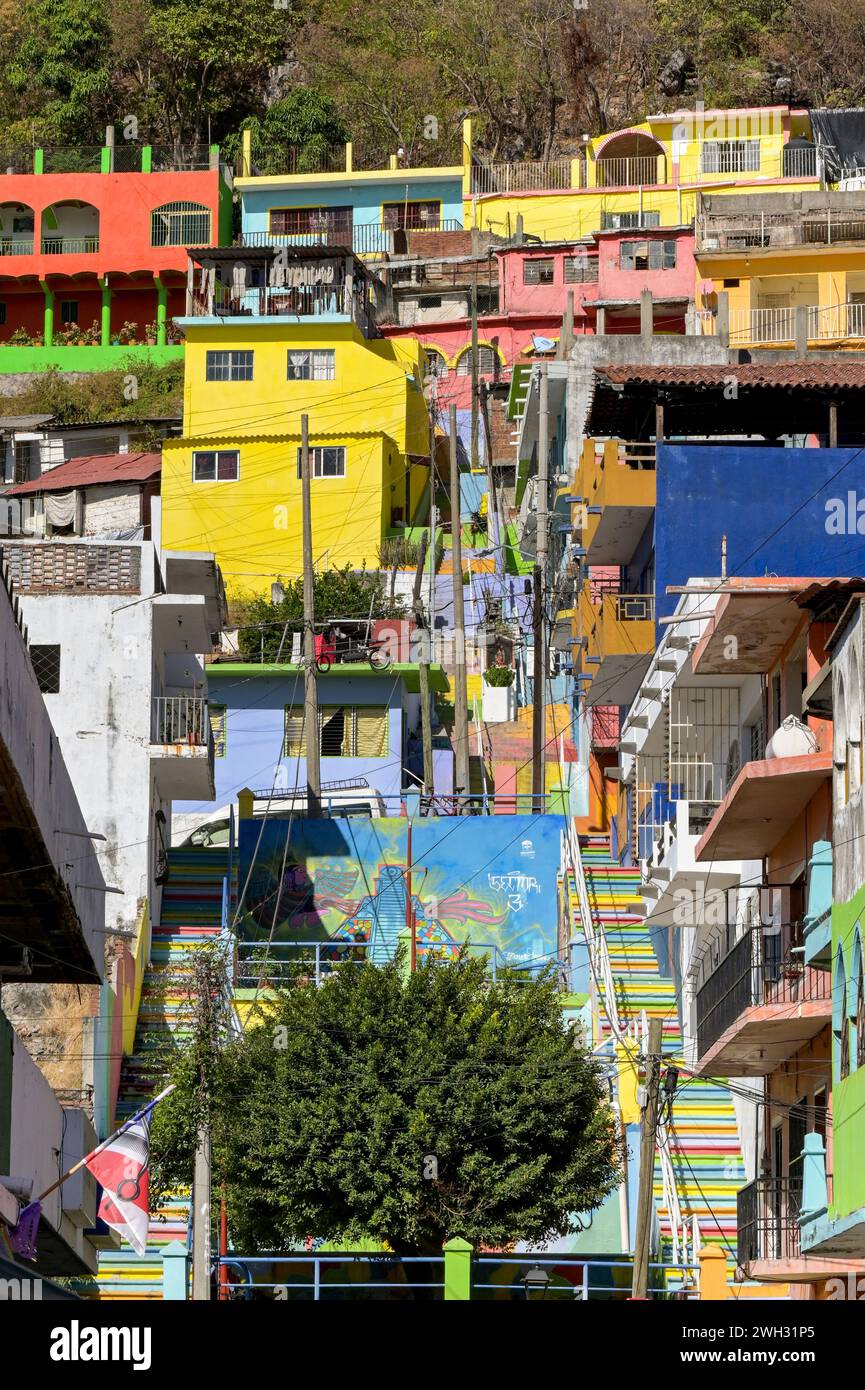 Manzanillo, Mexico - 16 January 2024: Multi coloured houses and steps ...