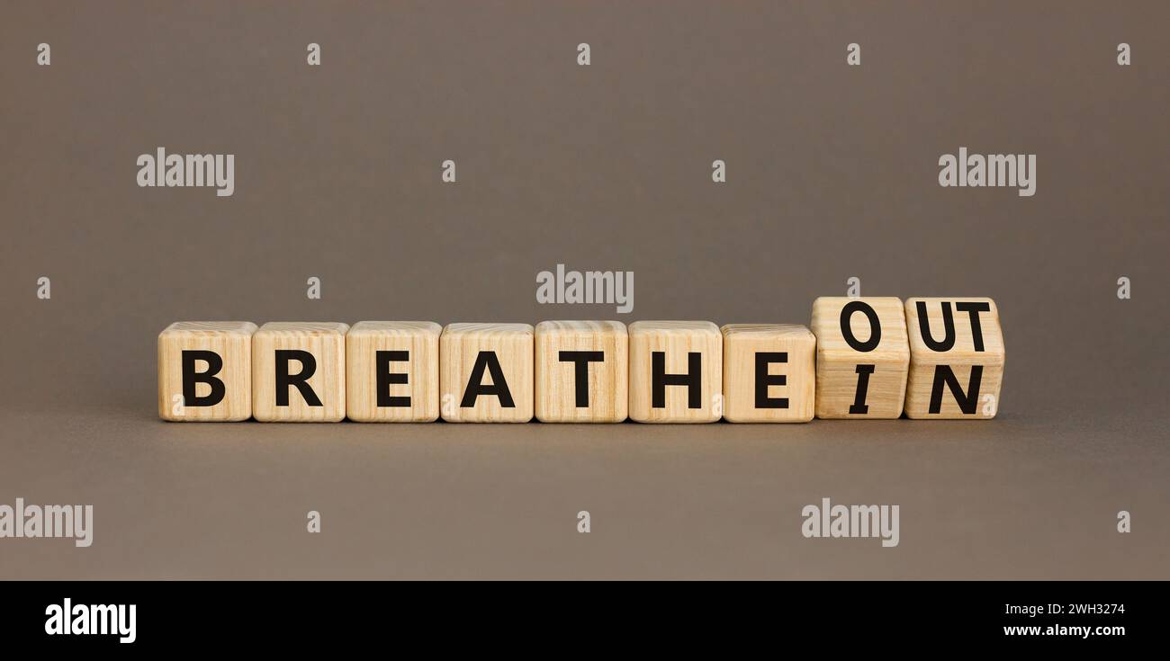 Breathe in and out symbol. Concept words Breathe in to Breathe out on ...
