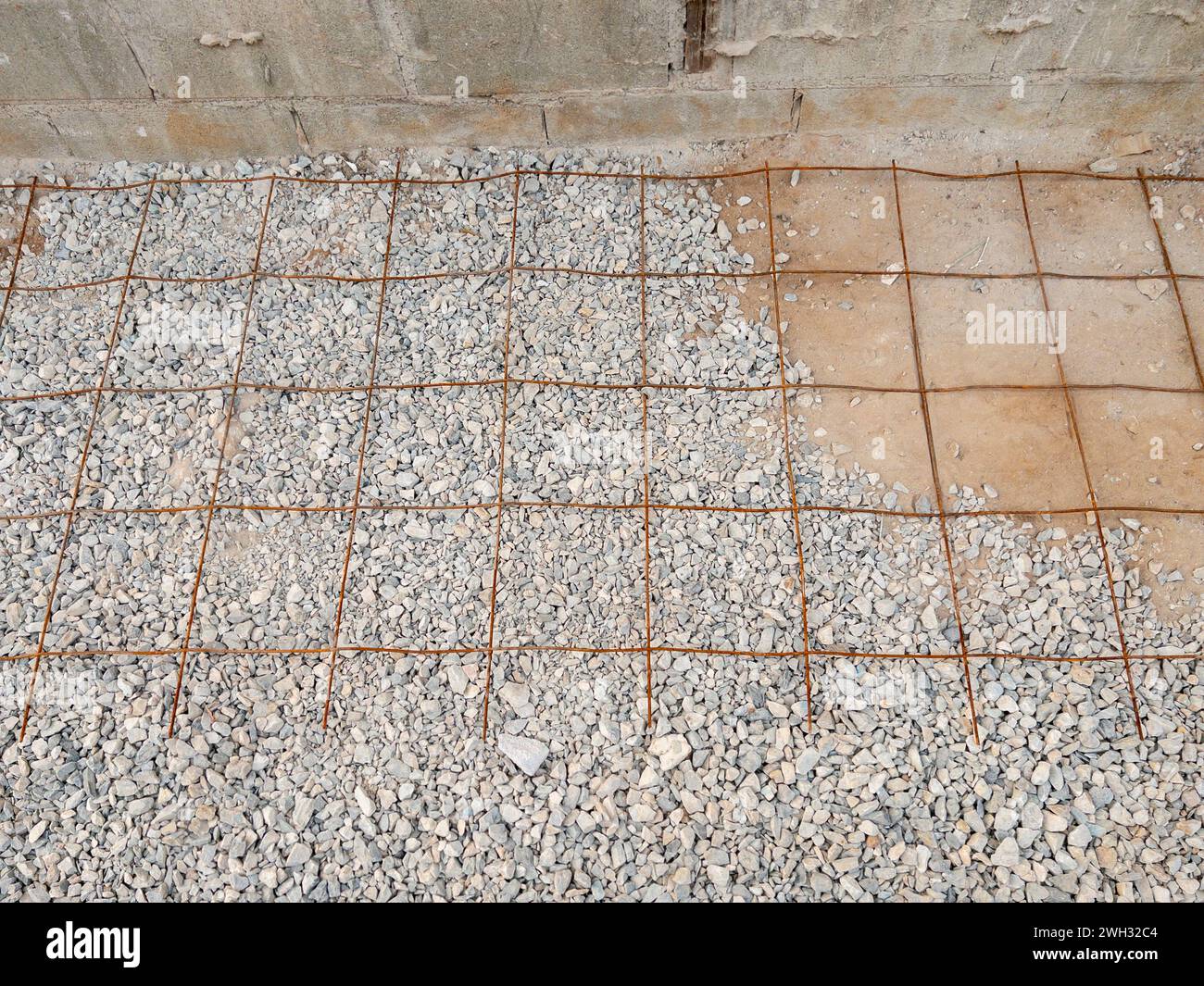 The metal wire mesh on the stone ground for use as structure of the ...