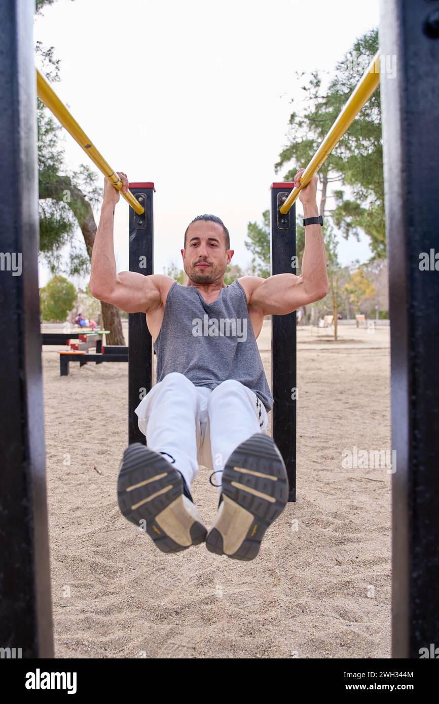 Fit Man Doing A Strong Calisthenics Workout Sporty Man performs ...