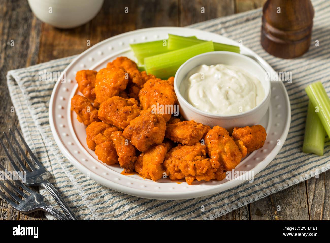 Spicy Boneless Buffalo Chicken Wings with Blue Cheese Stock Photo - Alamy