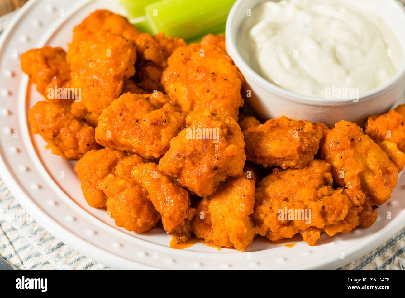 Spicy Boneless Buffalo Chicken Wings with Blue Cheese Stock Photo - Alamy