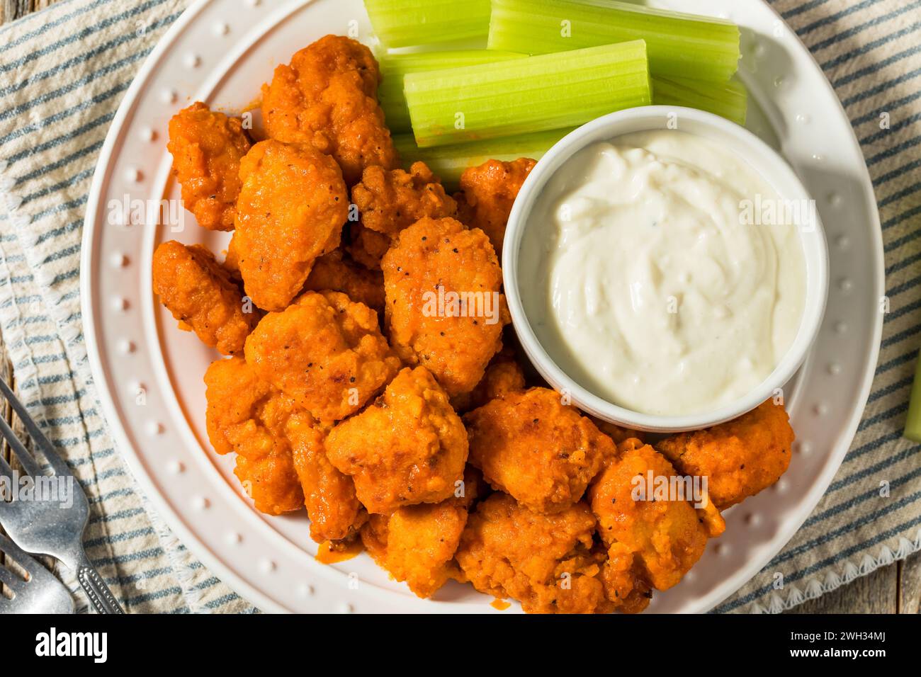 Spicy Boneless Buffalo Chicken Wings with Blue Cheese Stock Photo - Alamy