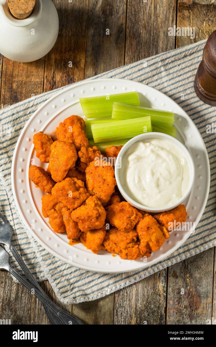 Spicy Boneless Buffalo Chicken Wings with Blue Cheese Stock Photo - Alamy