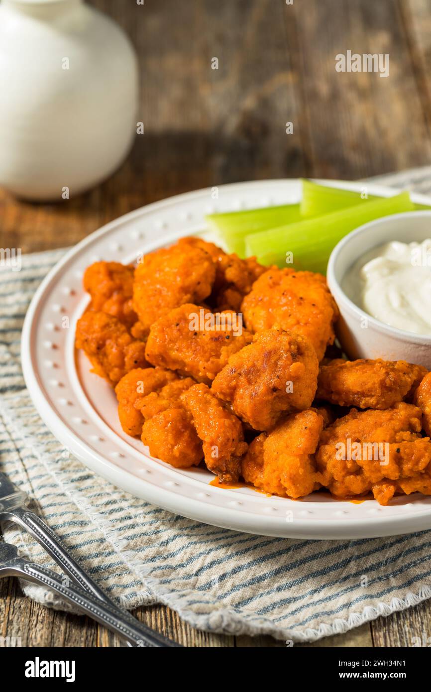 Spicy Boneless Buffalo Chicken Wings with Blue Cheese Stock Photo - Alamy