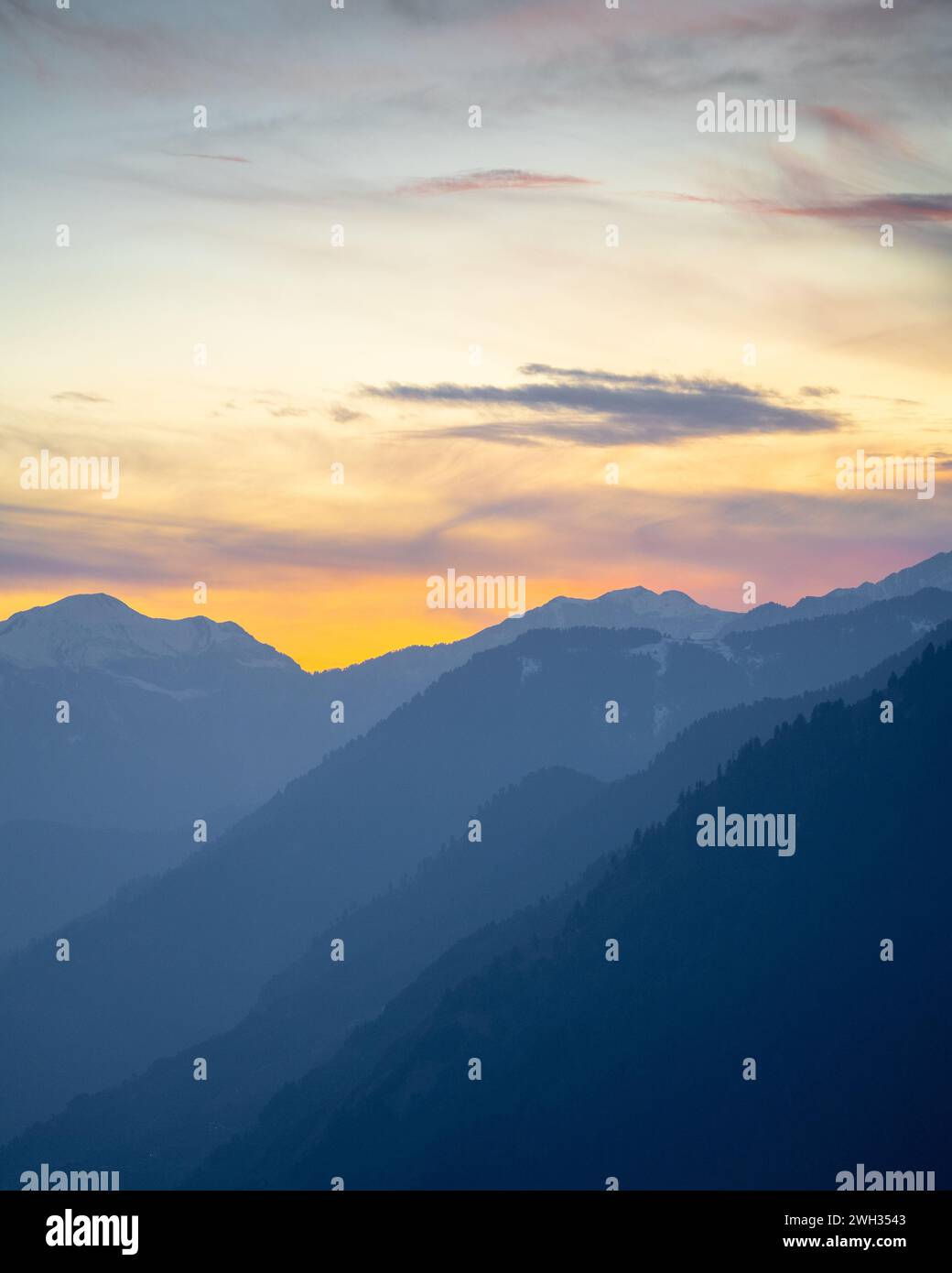 Sunrise sunset dusk dawn colors over the himalaya mountains with fog ...