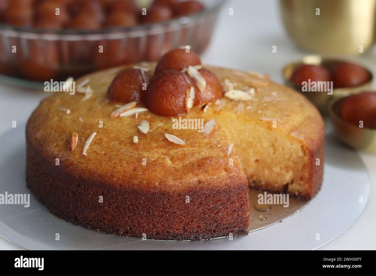 Sliced Gulab Jamun Cake, Irresistible fusion dessert, combining rich ...
