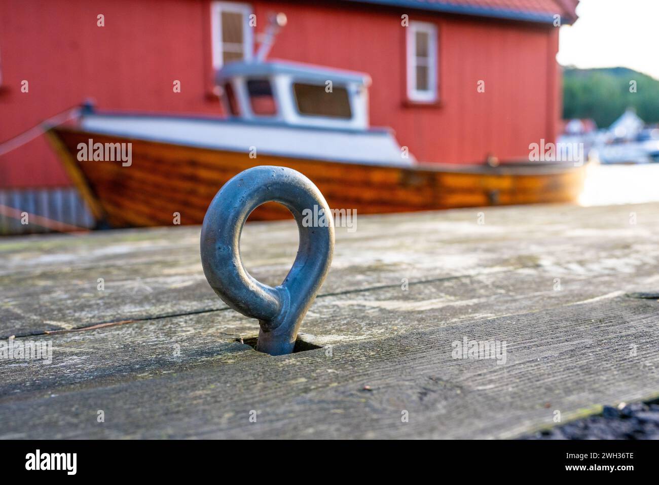 Mooring ring at a boat harbor Stock Photo - Alamy