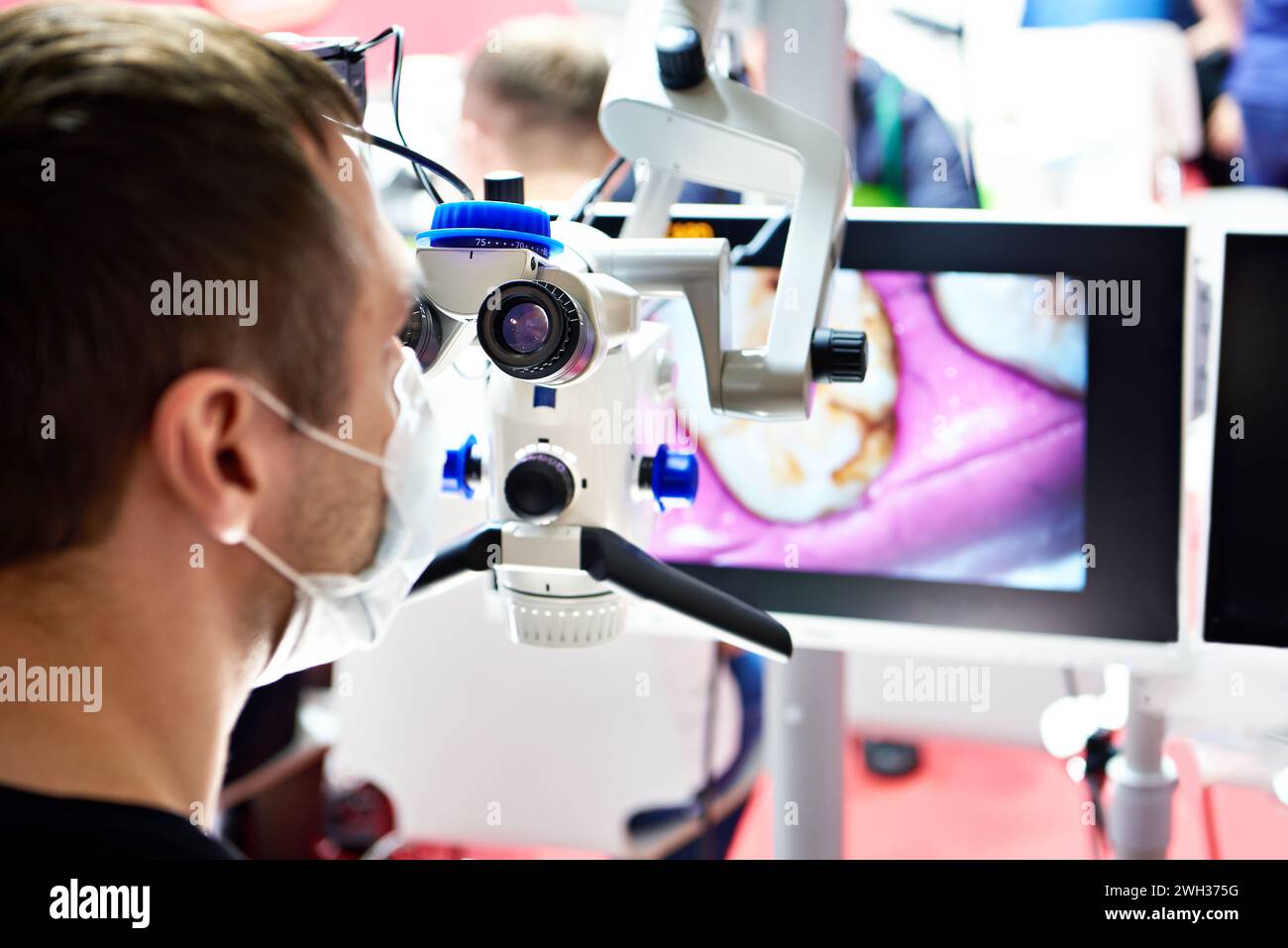 Dental surgical microscope and doctor Stock Photo - Alamy