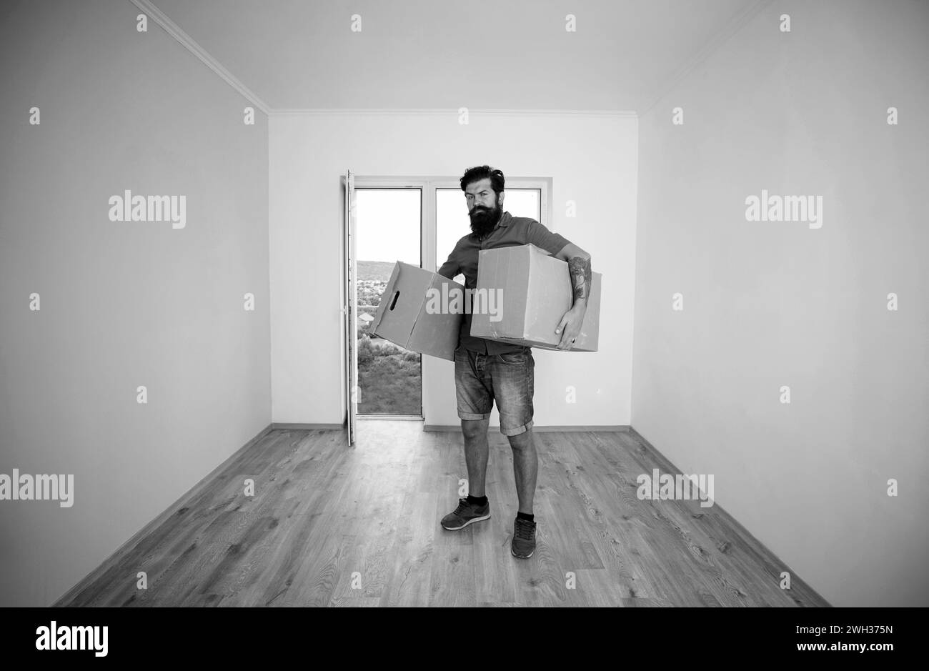 Real estate agent moving to new home. Moving to a new apartment. Box ...