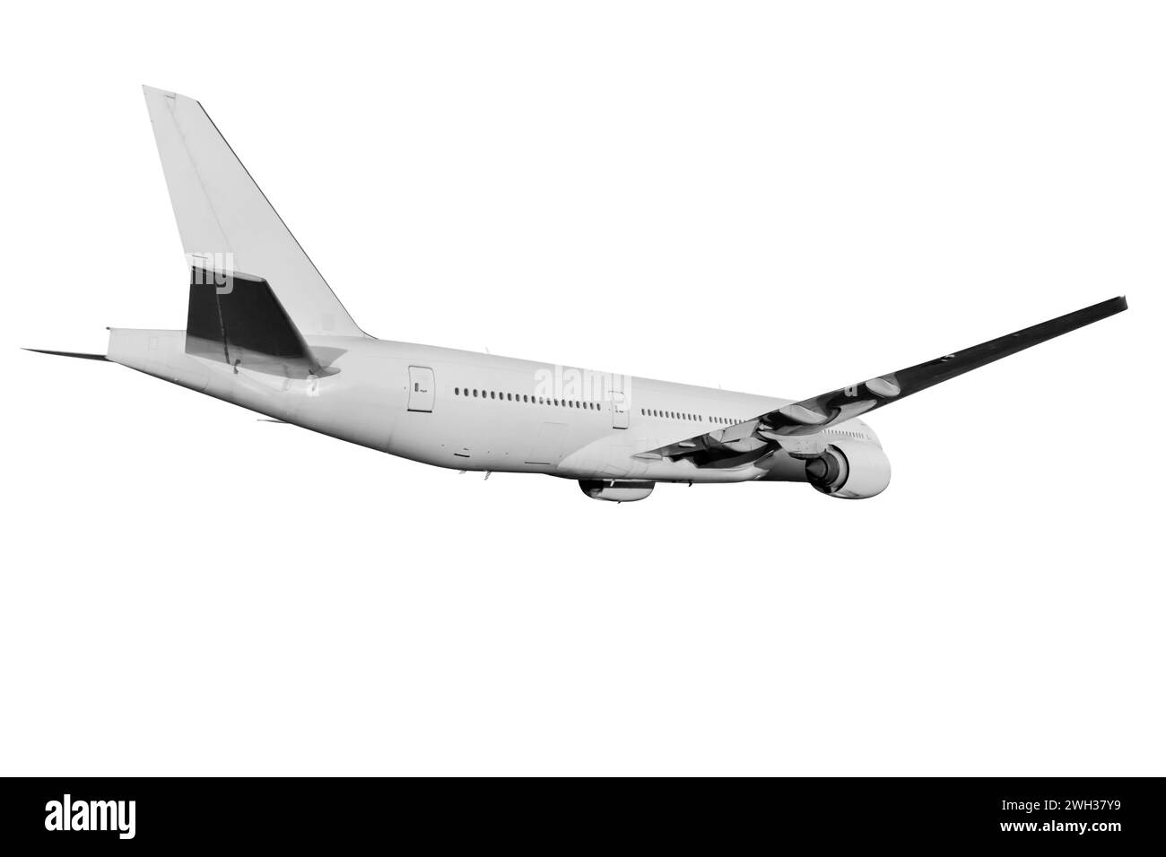 Wide body passenger jet plane flies isolated on white background Stock ...