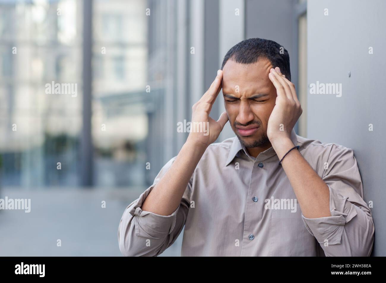 Frustrated rubbing temples hi-res stock photography and images - Alamy