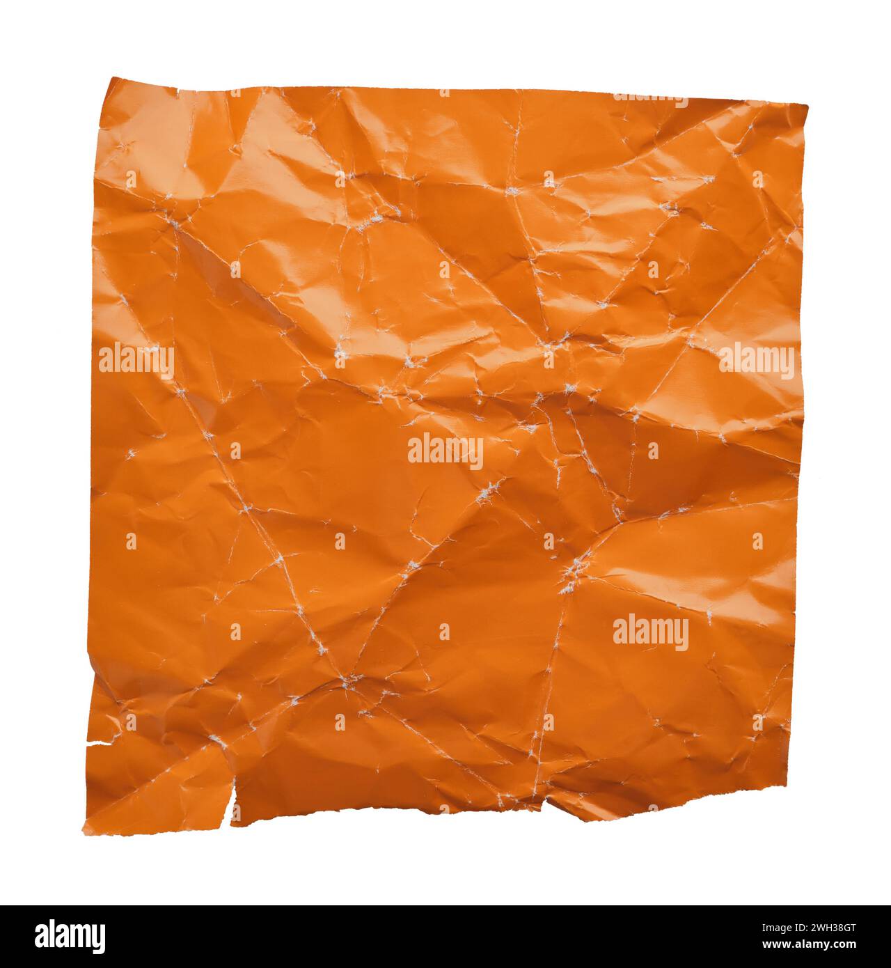 Orange crumpled paper with folds texture cut out on white background ...