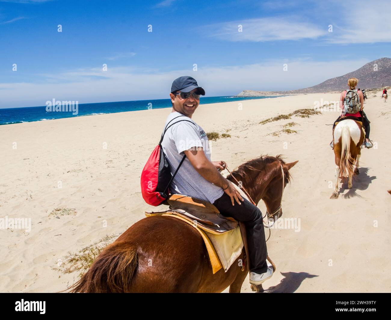 Horseback riding on the beach in Cabo San Lucas, Mexico Stock Photo - Alamy