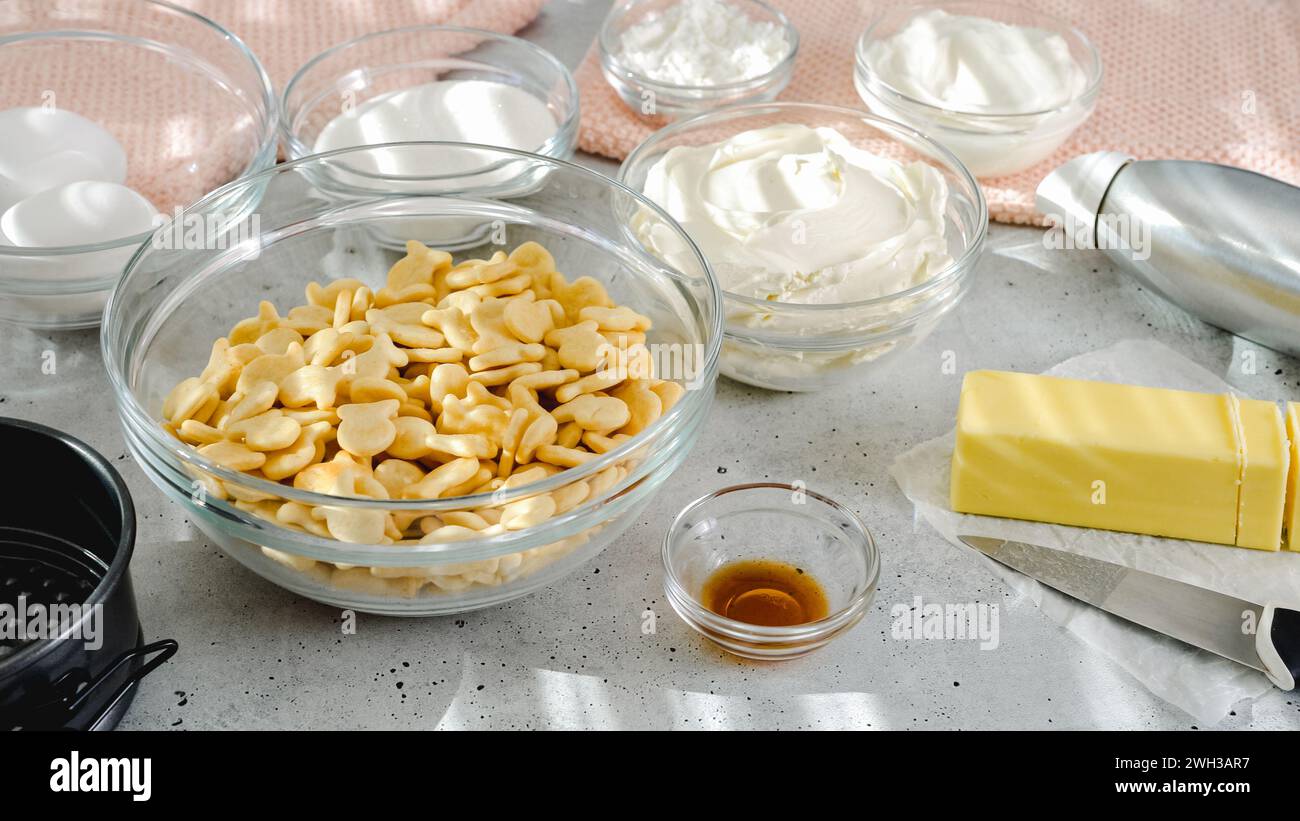 Cheesecake recipe. Ingredients close-up on the kitchen table. Cream ...