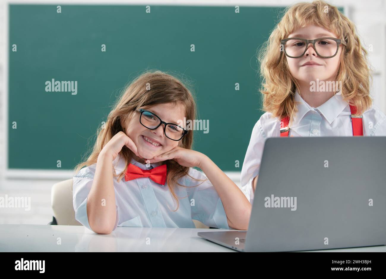 School friends learning together. Friendly classmates in school uniform ...