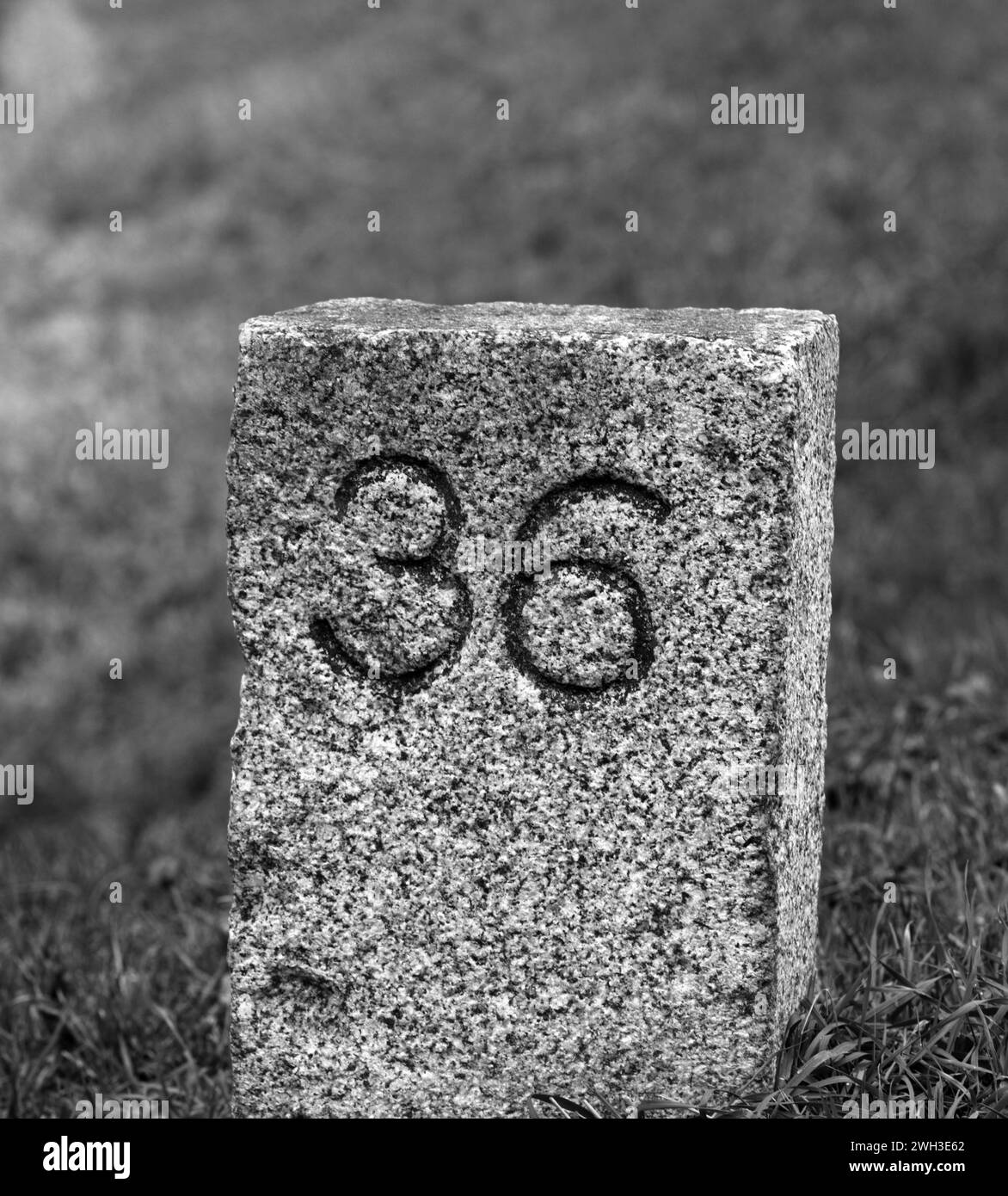 Stone wall placed with square stones number 36 Stock Photo - Alamy