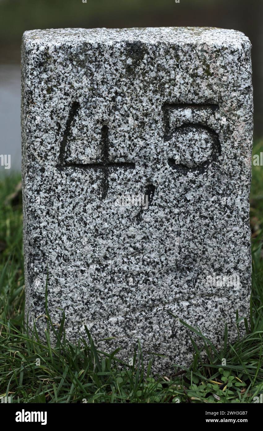 Stone wall placed with square stones number 4,5 Stock Photo - Alamy