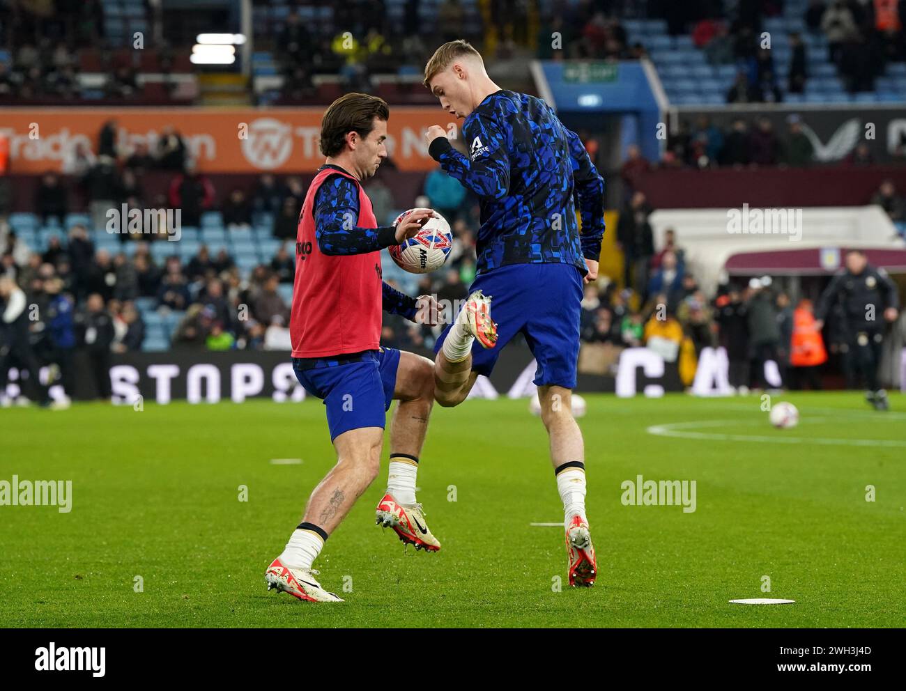 Chelsea's Ben Chilwell (left) and Cole Palmer warming up before the ...