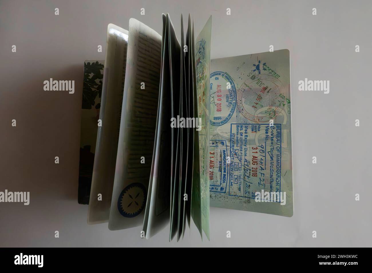 Passport with immigration stamps Stock Photo - Alamy