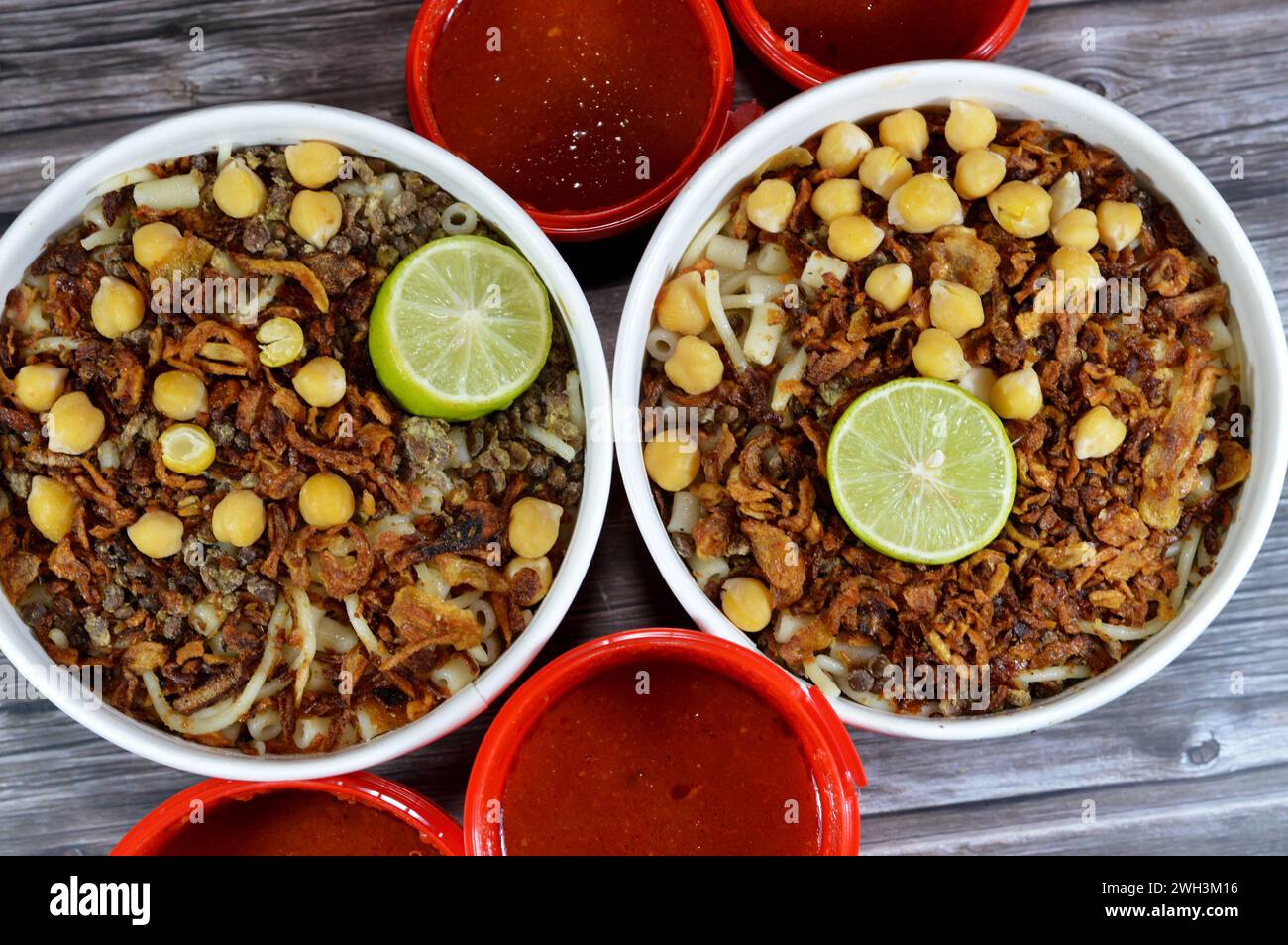 Egyptian cuisine of Koshary, a popular street food made of rice ...