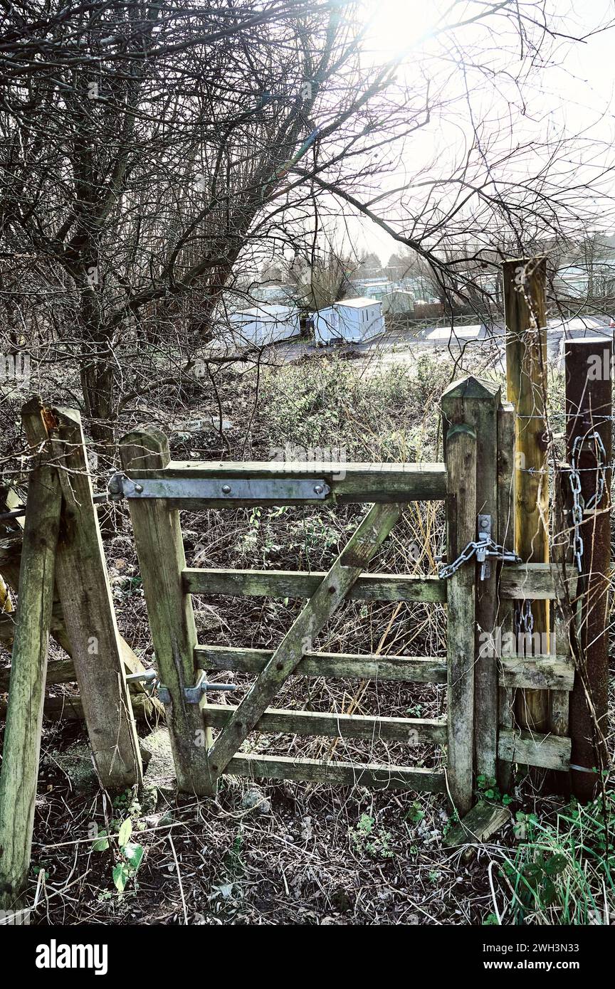 Old wooden gate at entrance to caravan site Stock Photo - Alamy