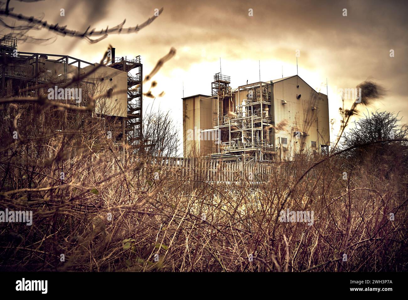 Industrial chemical polymer plant on the banks of the River Wyre Stock ...