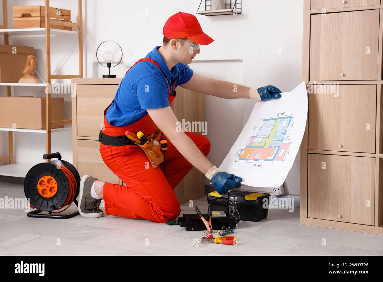 Male electrician house plan hi-res stock photography and images - Alamy