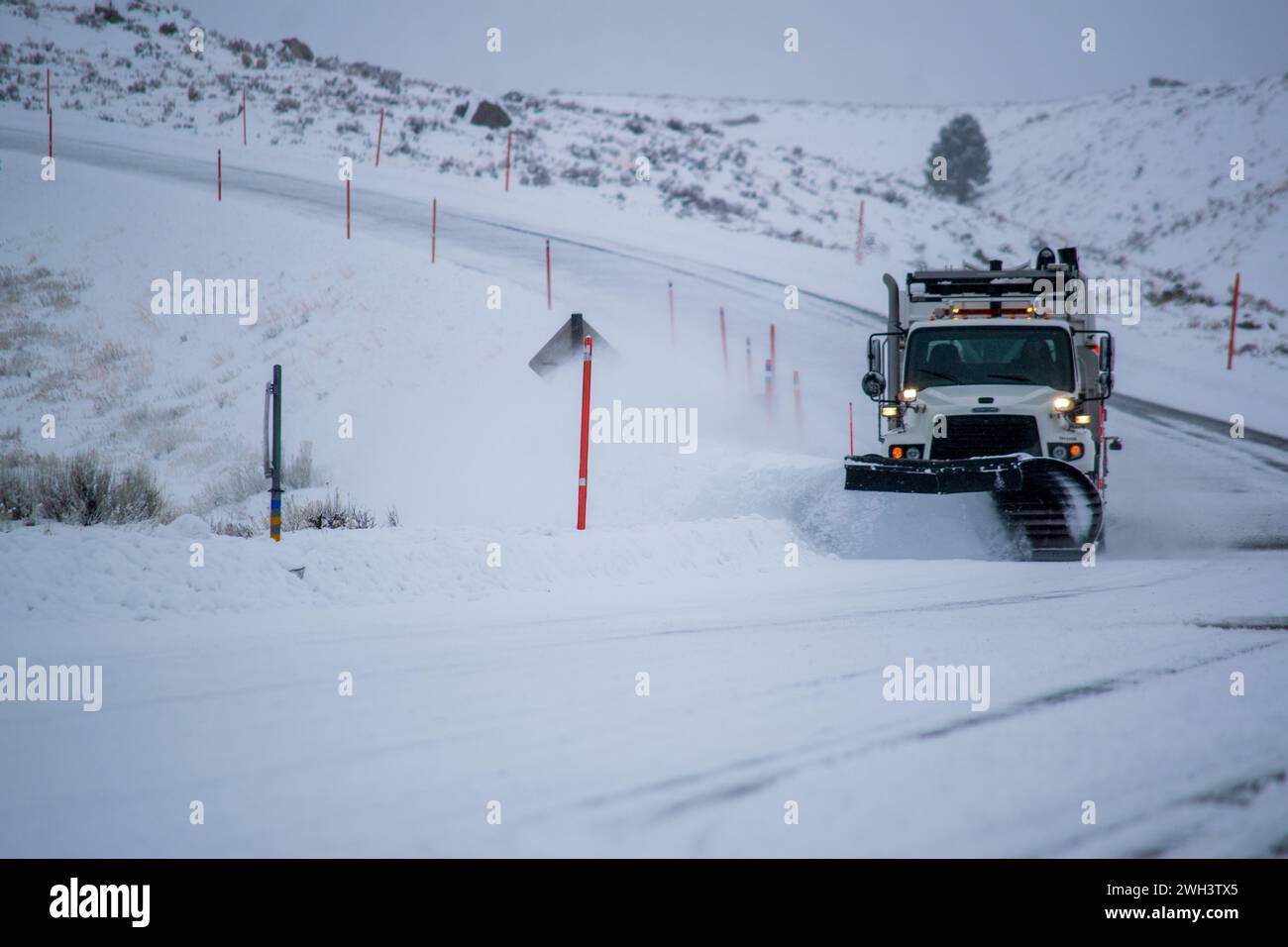 Caltrans plows the snow on U.S. 395 in Mono County, CA, during and ...