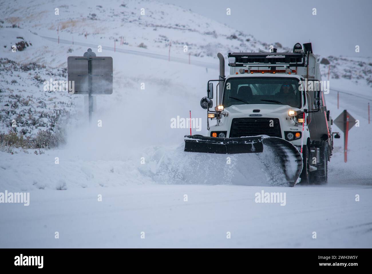 Caltrans plows the snow on U.S. 395 in Mono County, CA, during and ...
