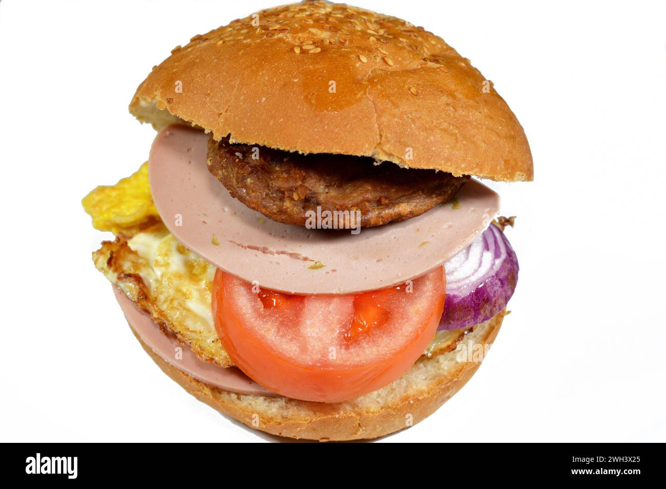 spicy fried beef burger cooked in a boiling shallow oil with slices of ...