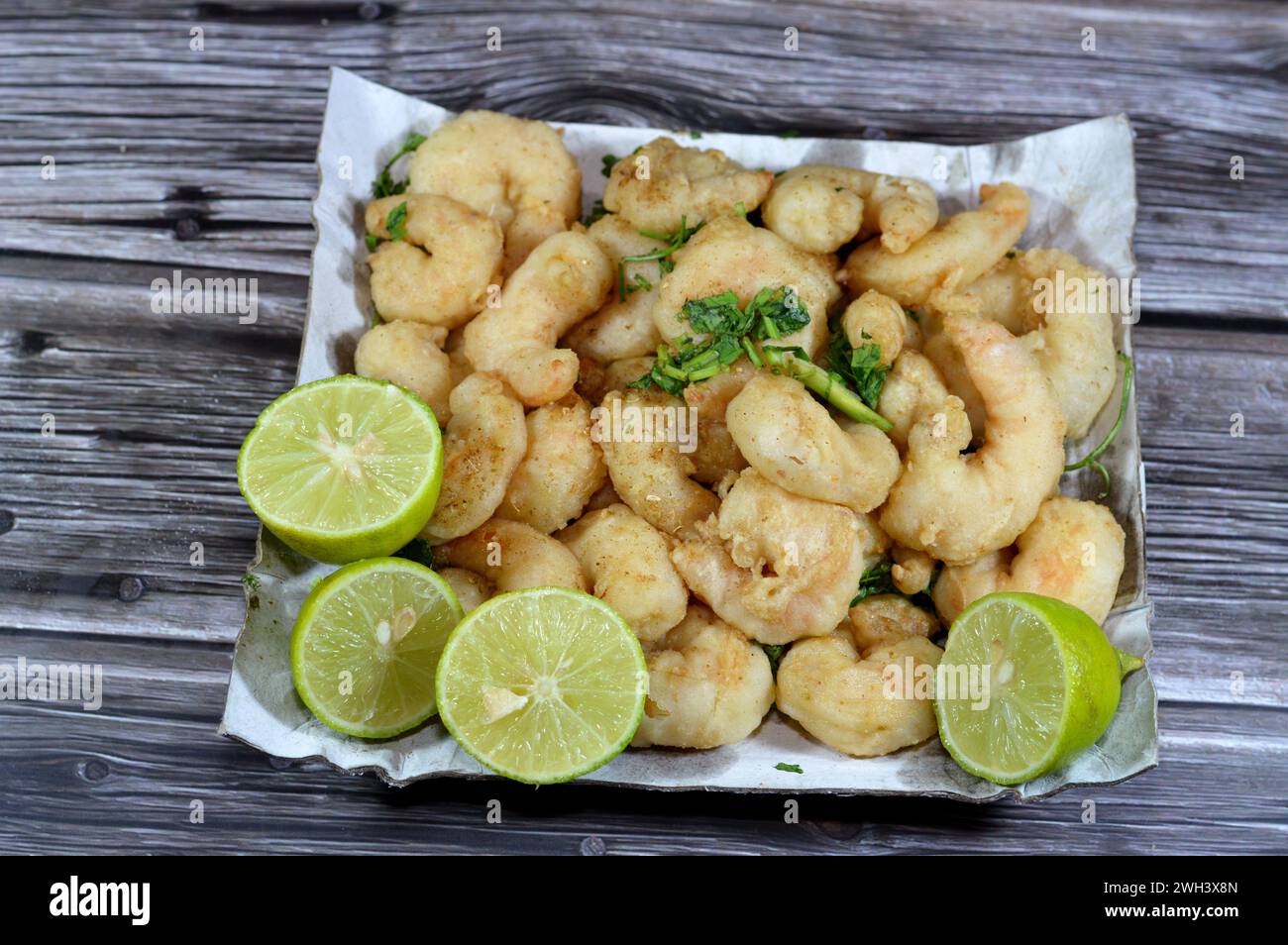 Fried shrimps covered with flour and fried in deep hot oil, shrimps are ...