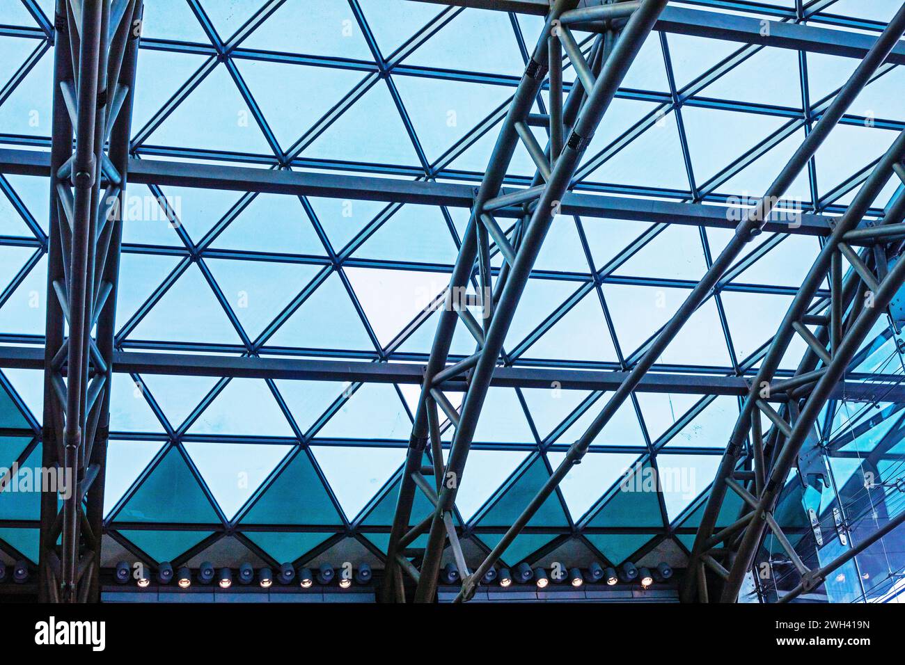 modern glass roof made of triangles in a shopping center Stock Photo ...