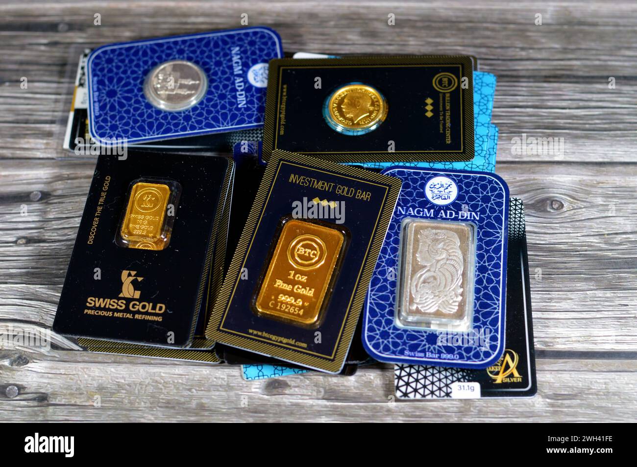 Cairo, Egypt, January 29 2024: BTC, Sam, Swiss gold pure gold, Nagm Ad ...