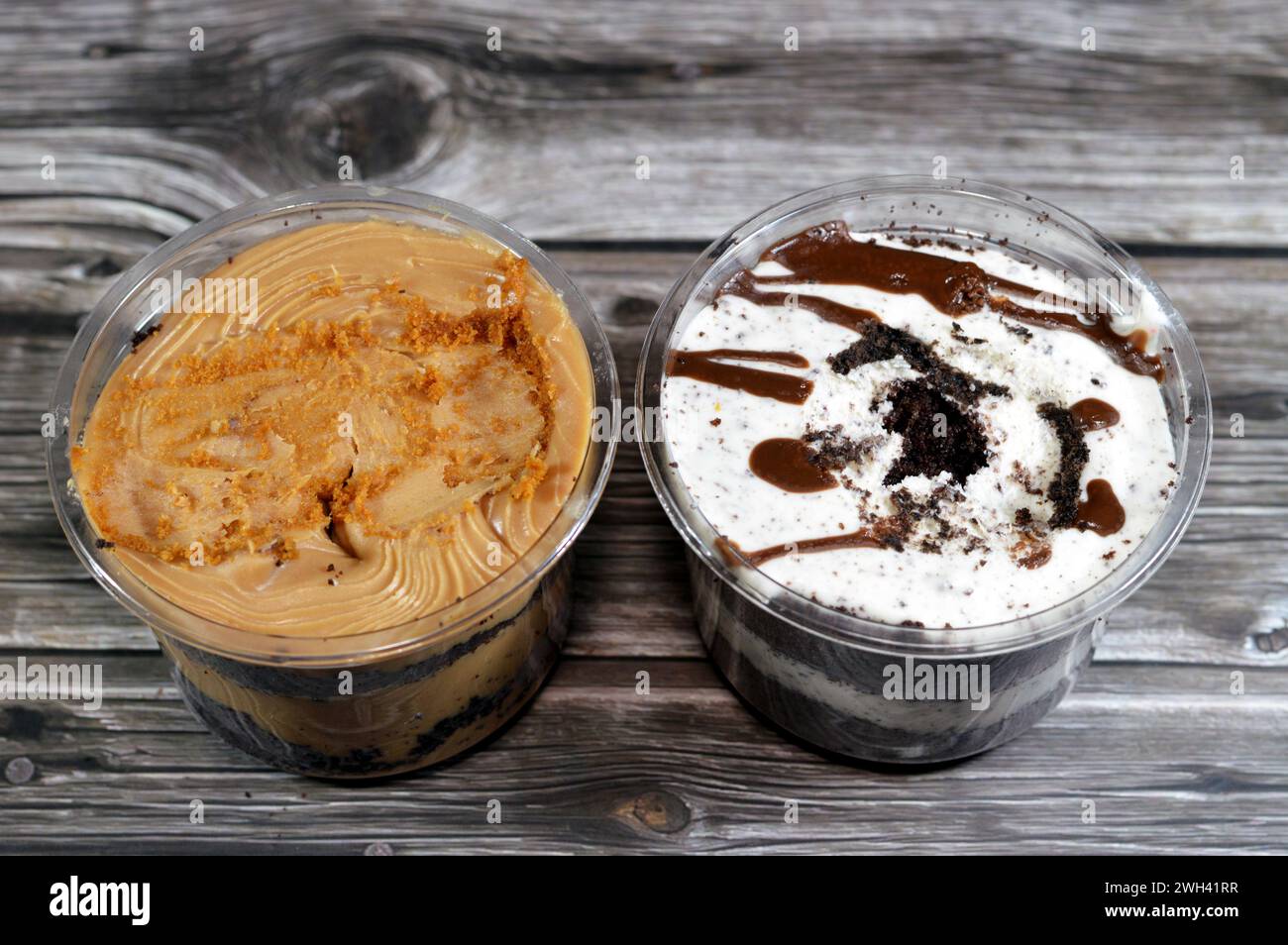 creamy biscuit mousse with chocolate sauce, with fudge cake and brown ...