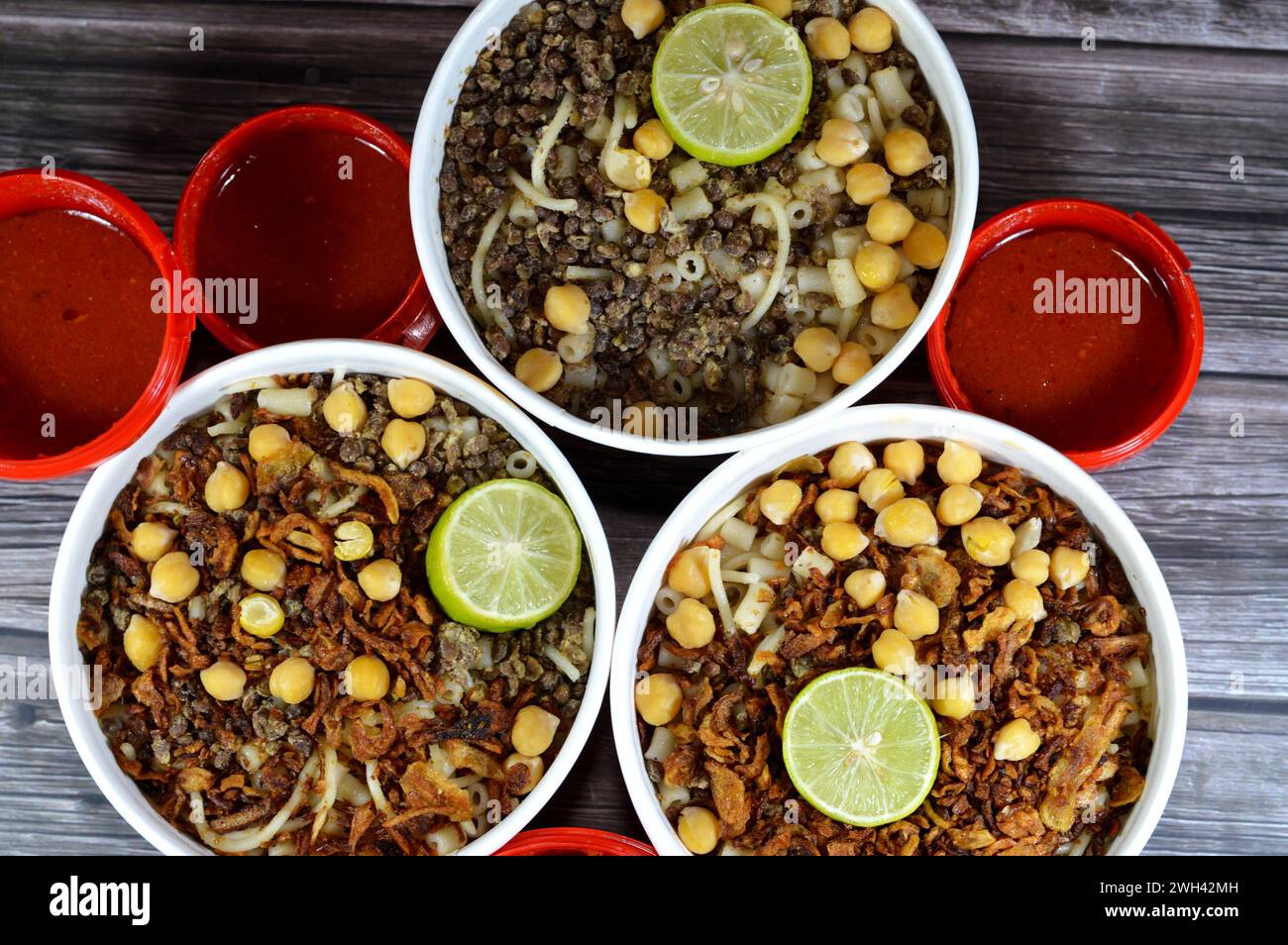 Egyptian cuisine of Koshary, a popular street food made of rice ...