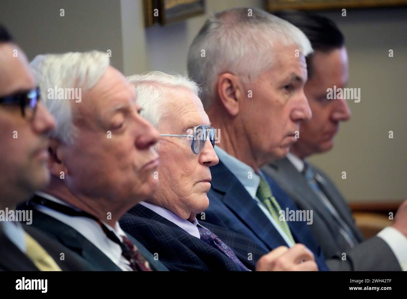 Mississippi Department of Corrections Commissioner Burl Cain, center ...