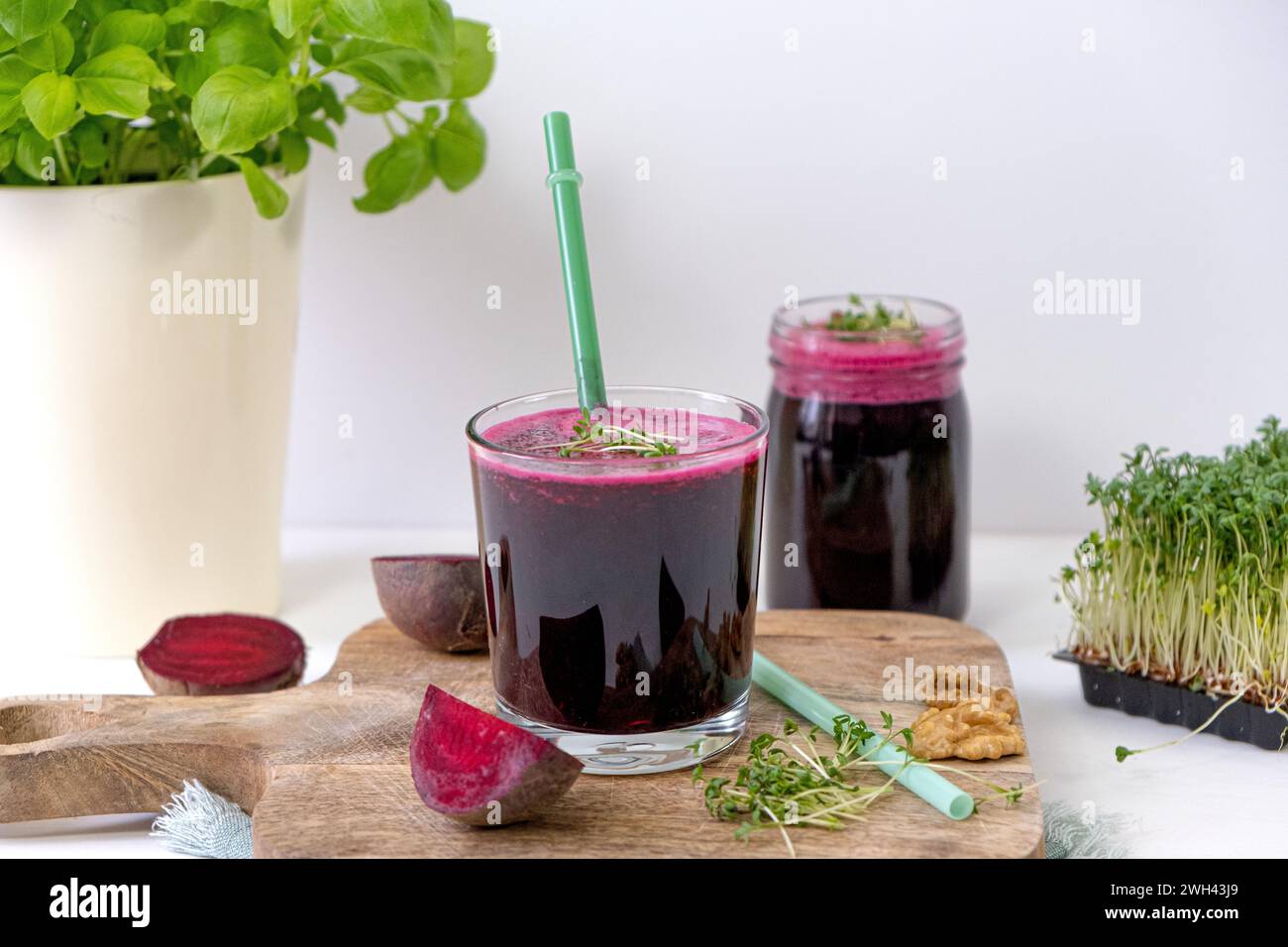 Beet smoothie. Beet smoothie with nuts and microgreens Stock Photo - Alamy