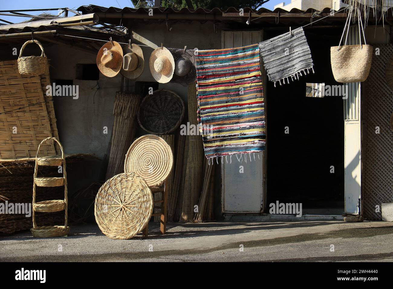 A store of various straw items in Lebanon Stock Photo - Alamy